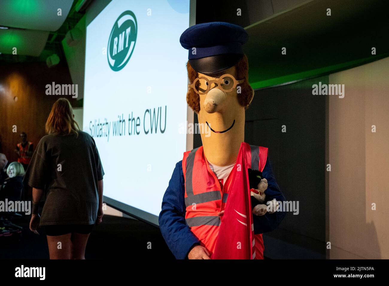 London, UK. 31 August 2022. A person in a Postman Pat costume at the ...