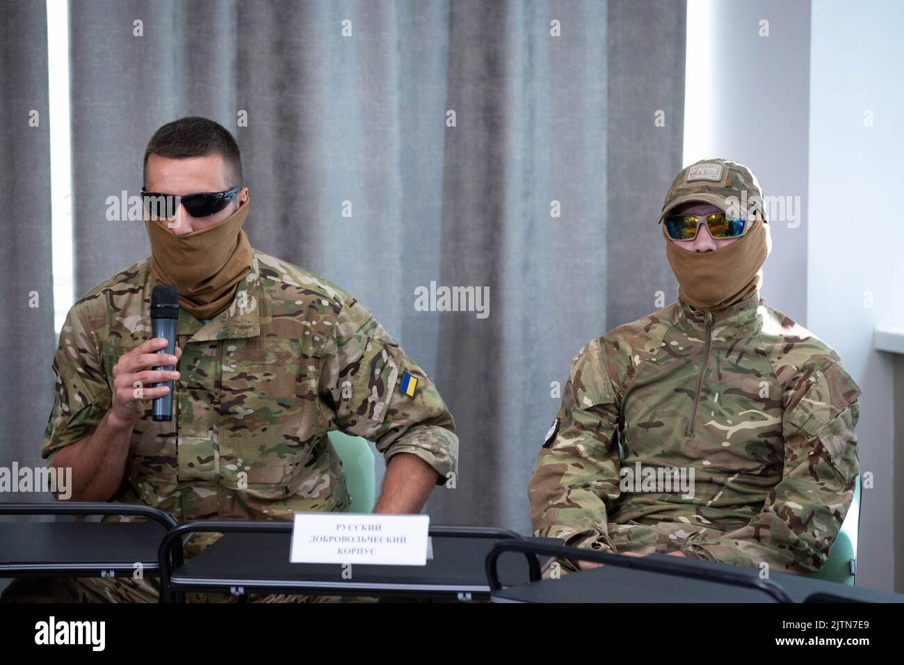 Soldiers of the Russian Legion "Freedom of Russia" attend a forum after ...