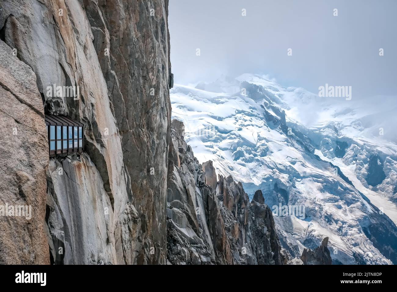 Windows of the viewpoint of Aiguille du Midi in Montblanc, with views of the snowy mountain ...