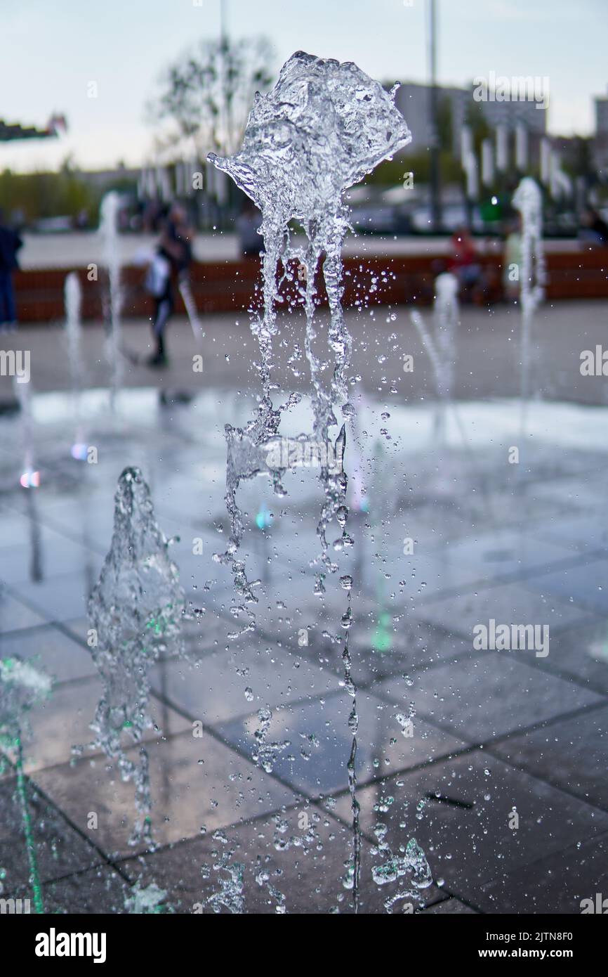 Splashes water from city fountain hi-res stock photography and images ...