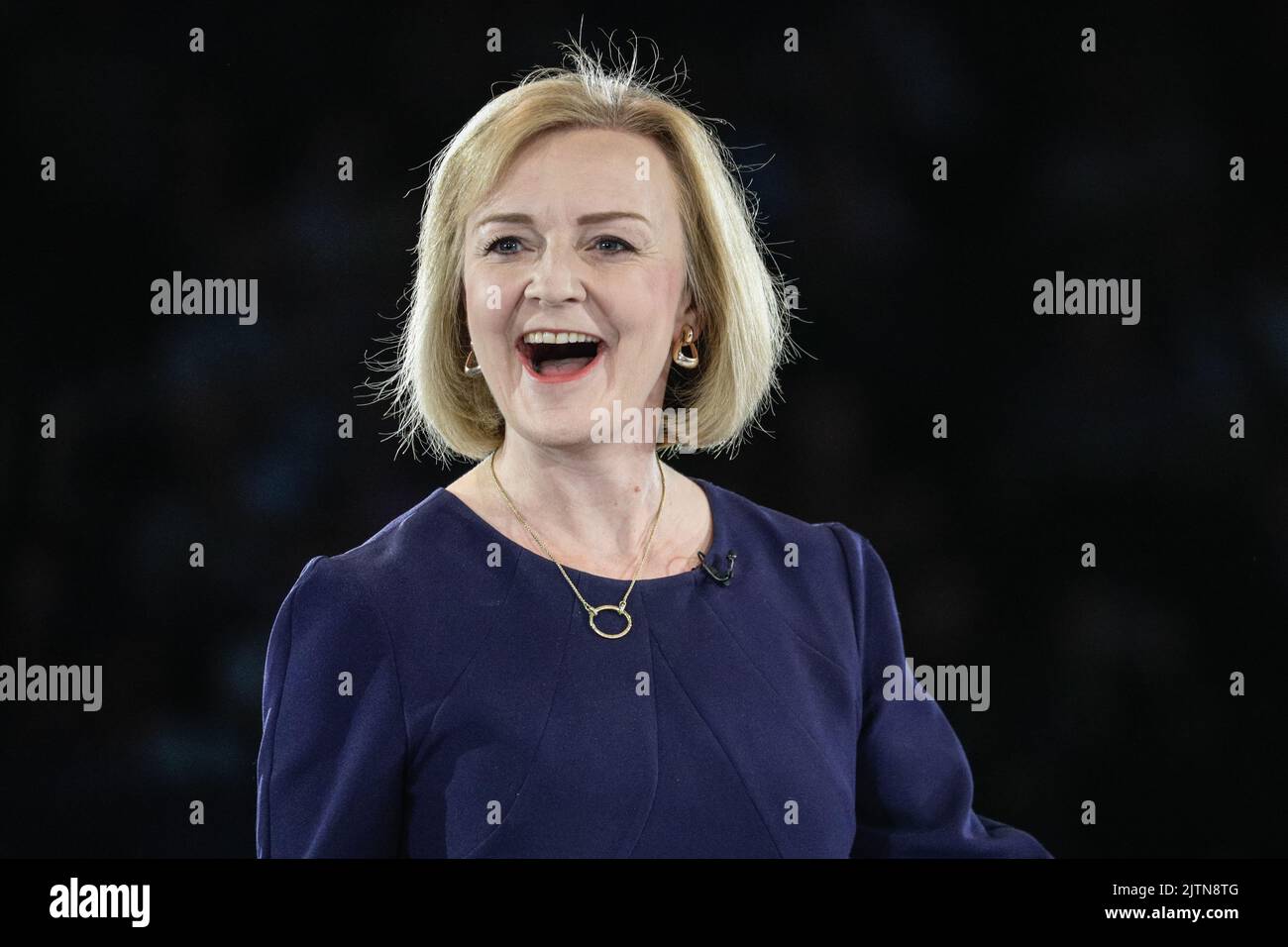 London, UK. 31st Aug, 2022. Liz Truss close up of face, smiling, looks ...