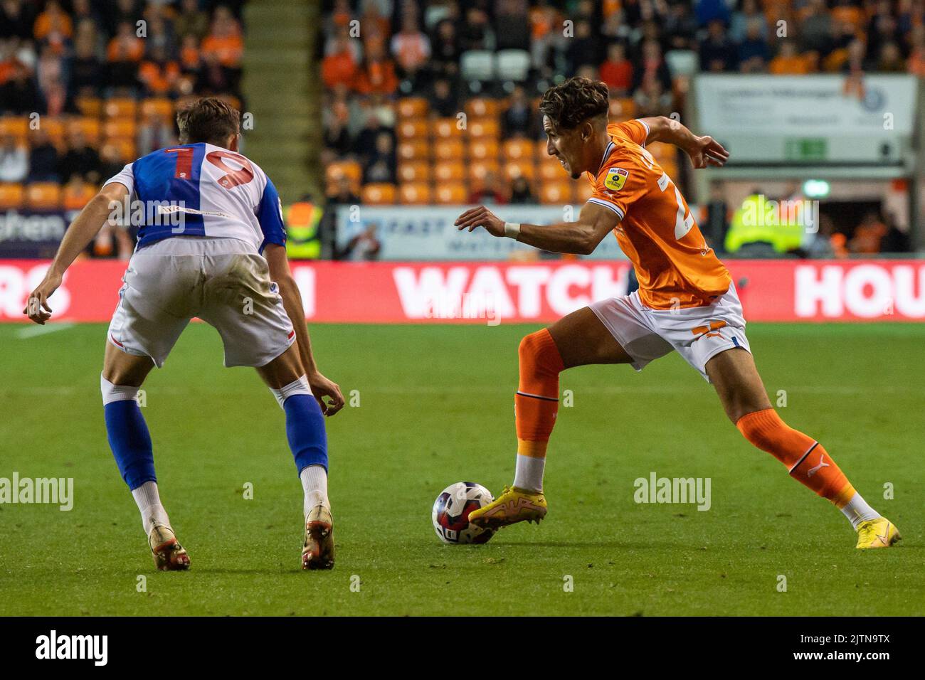 Theo Corbeanu #25 of Blackpool makes a break with the ball Stock Photo ...