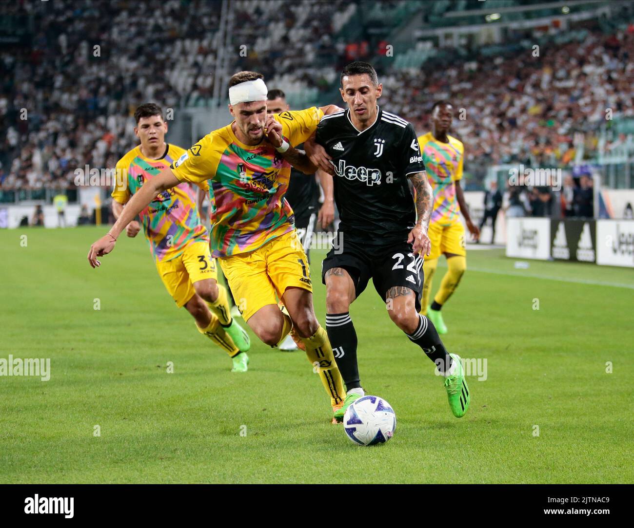Angel Di Maria of Juventus Fc and Petko Hristov of Spezia Calcio during ...