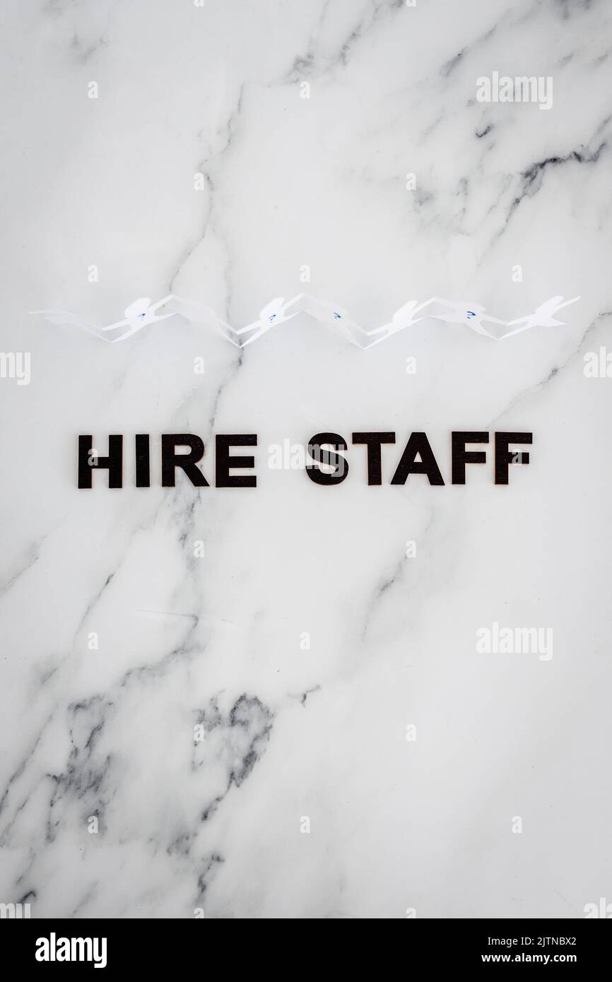 staff shortages and workforce conceptual image, Hire Staff text with ...