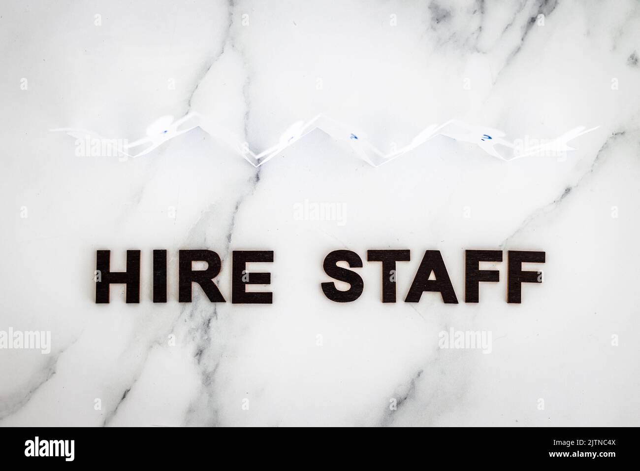 staff shortages and workforce conceptual image, Hire Staff text with ...