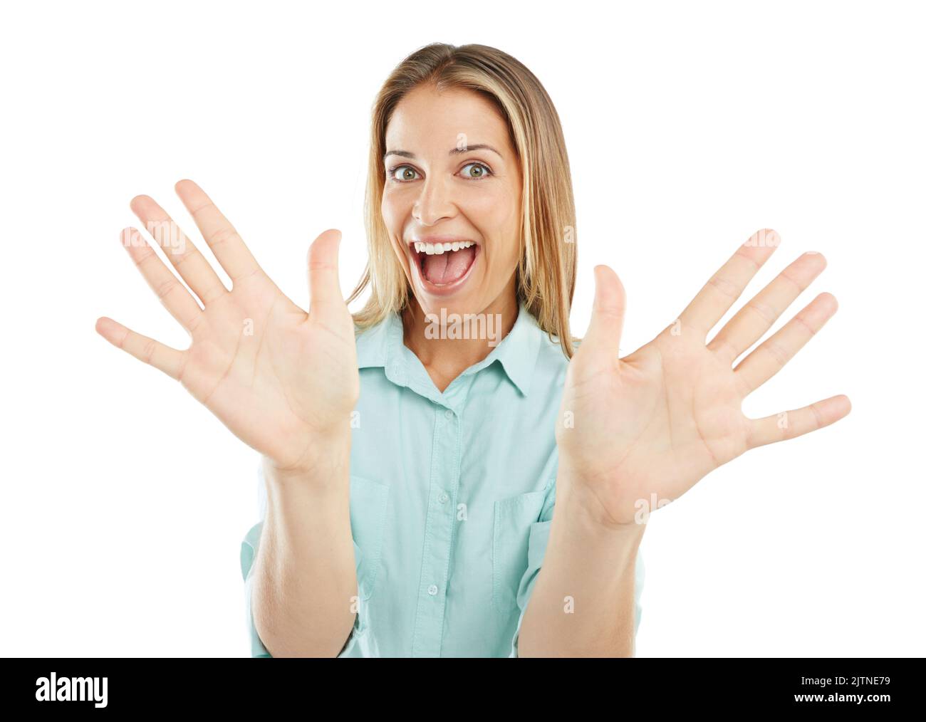 Hey, its a brand new day. a happy woman posing with her hands up ...