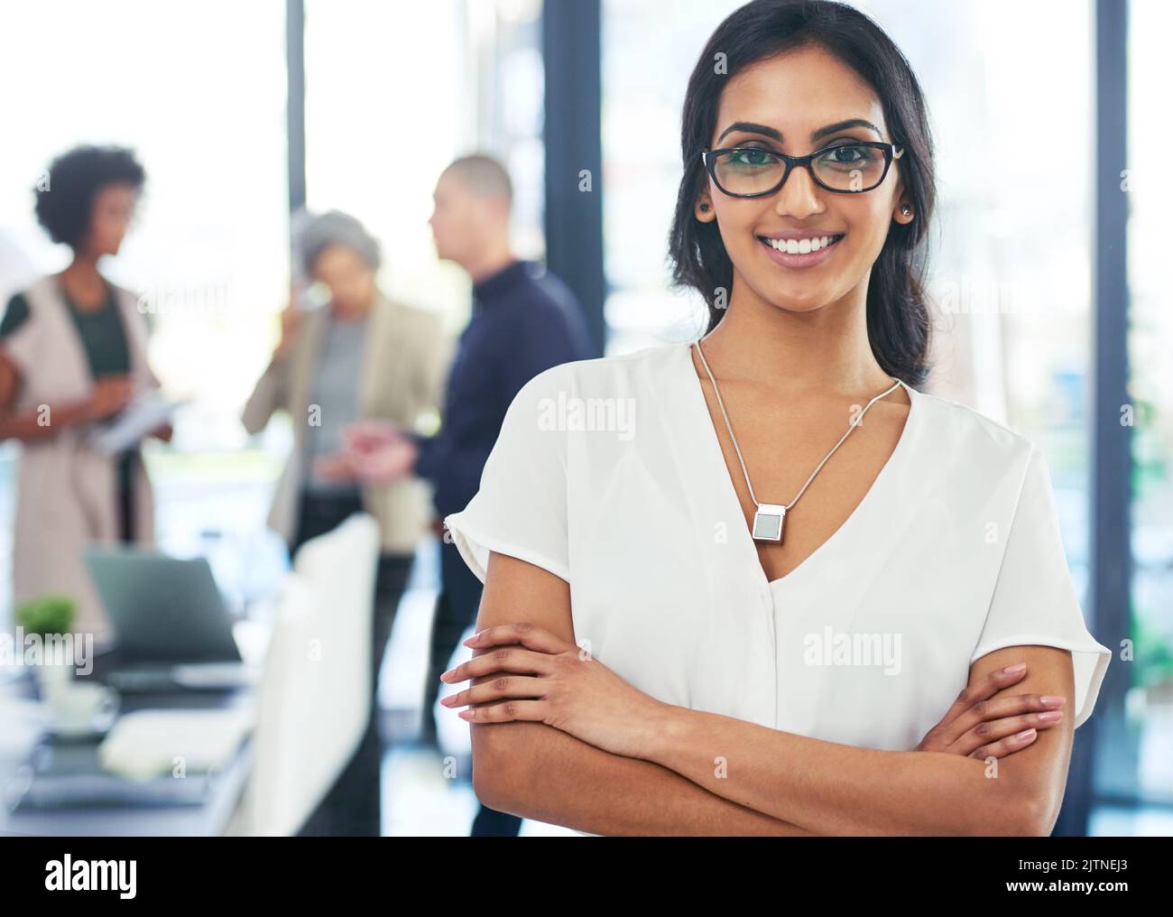 I motivate my team with a positive attitude. Portrait of a ...