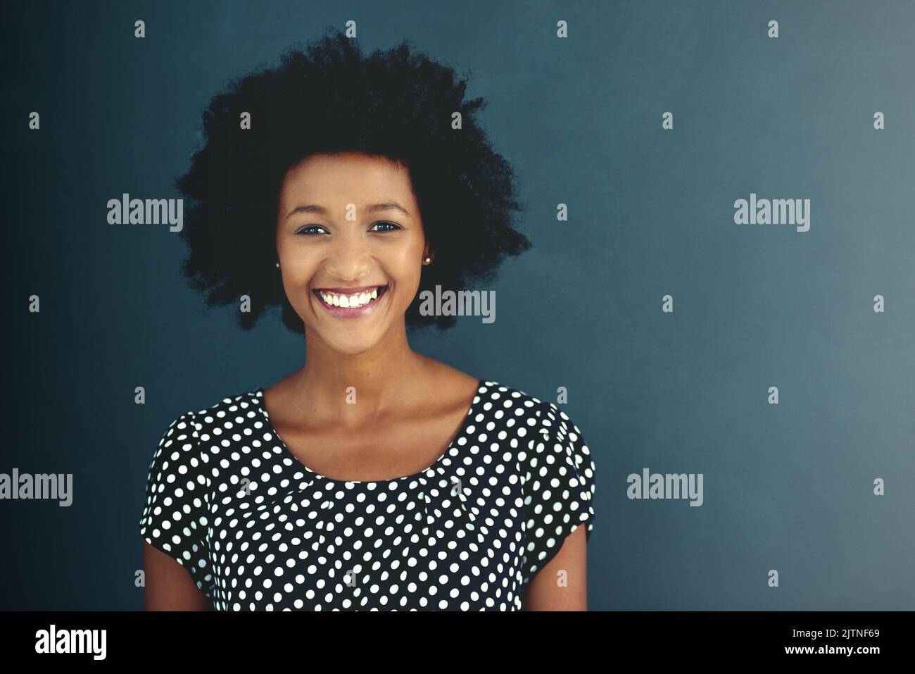 Success always make me smile. Portrait of an attractive young ...