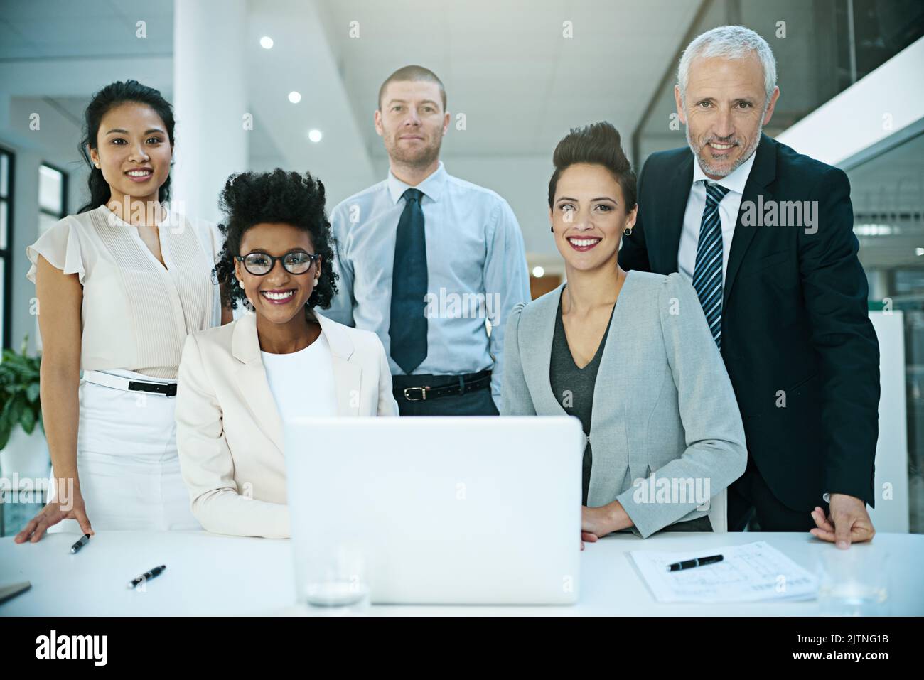 We achieve our successes as part of a team. Portrait of a group of ...