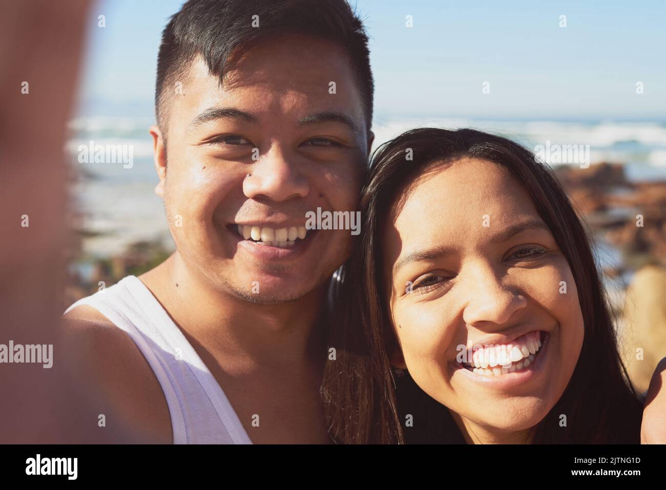 We want to remember this moment. Selfie of a happy young couple by the ...