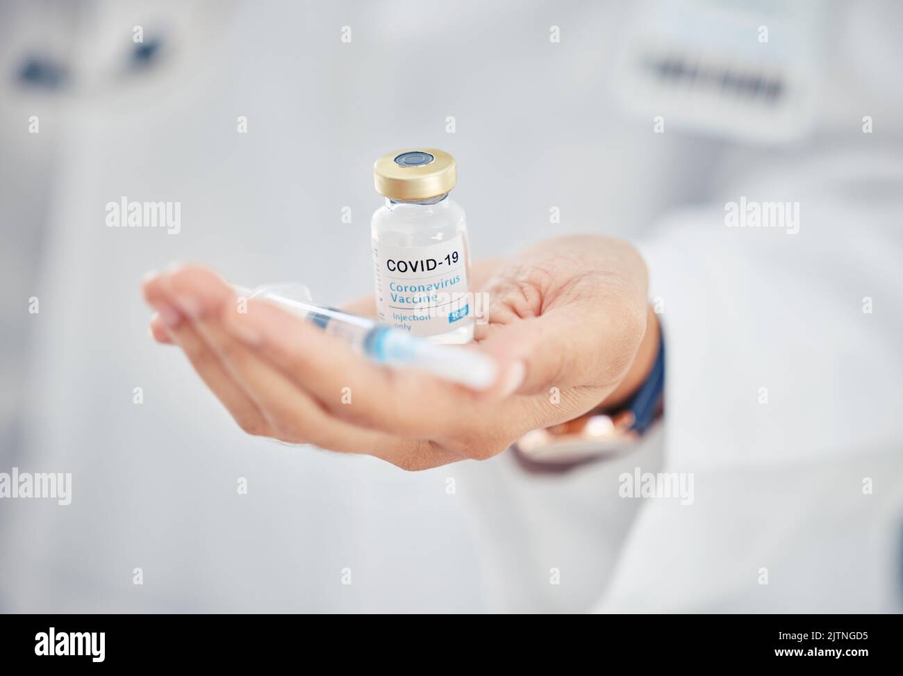 Covid vaccine vial, doctor hands and medicine injection for healthcare ...