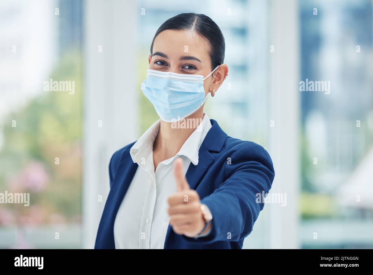 Face mask, covid compliance or thumbs up woman portrait with strategy ...