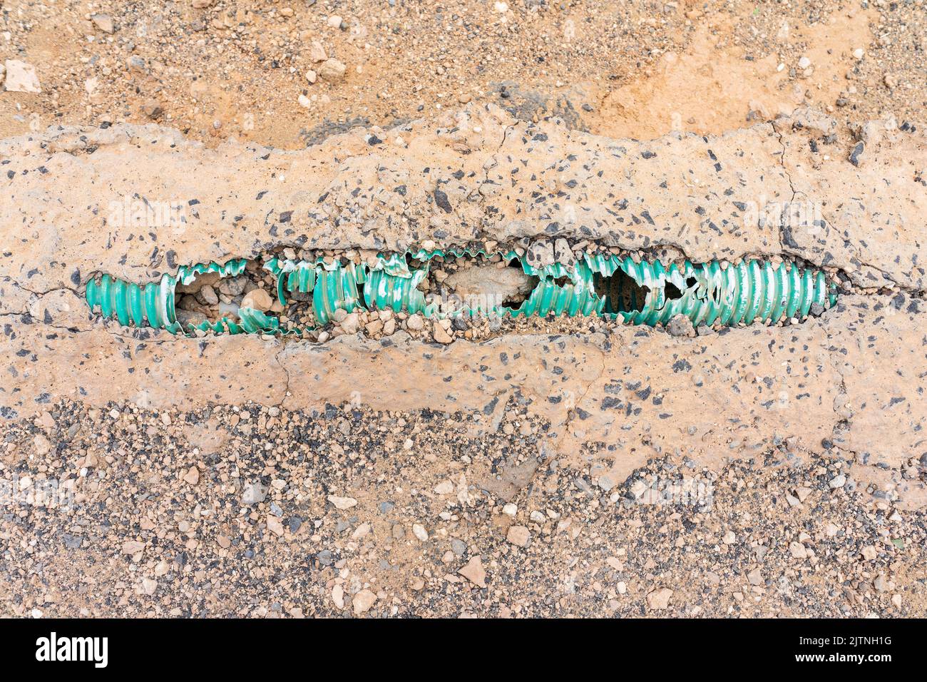 Cemented and damaged electrical cable channel Stock Photo - Alamy