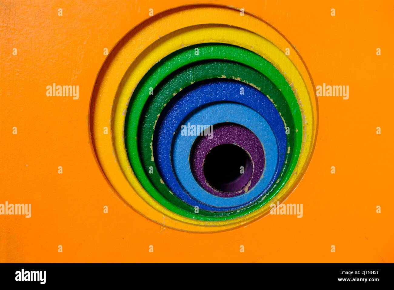 Multicolored children's wooden toy blocks with concentric circles cut ...