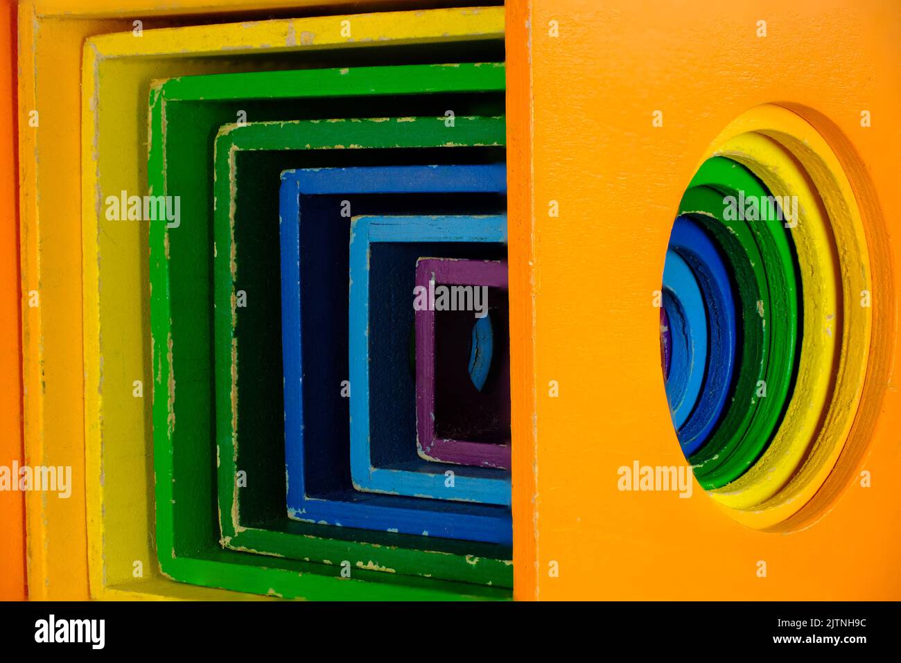 Multicolored children's wooden toy blocks with concentric circles cut ...