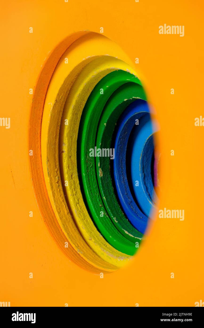 Multicolored children's wooden toy blocks with concentric circles cut ...
