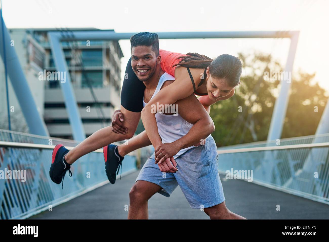 Those that play together, stay together. a young couple messing around ...