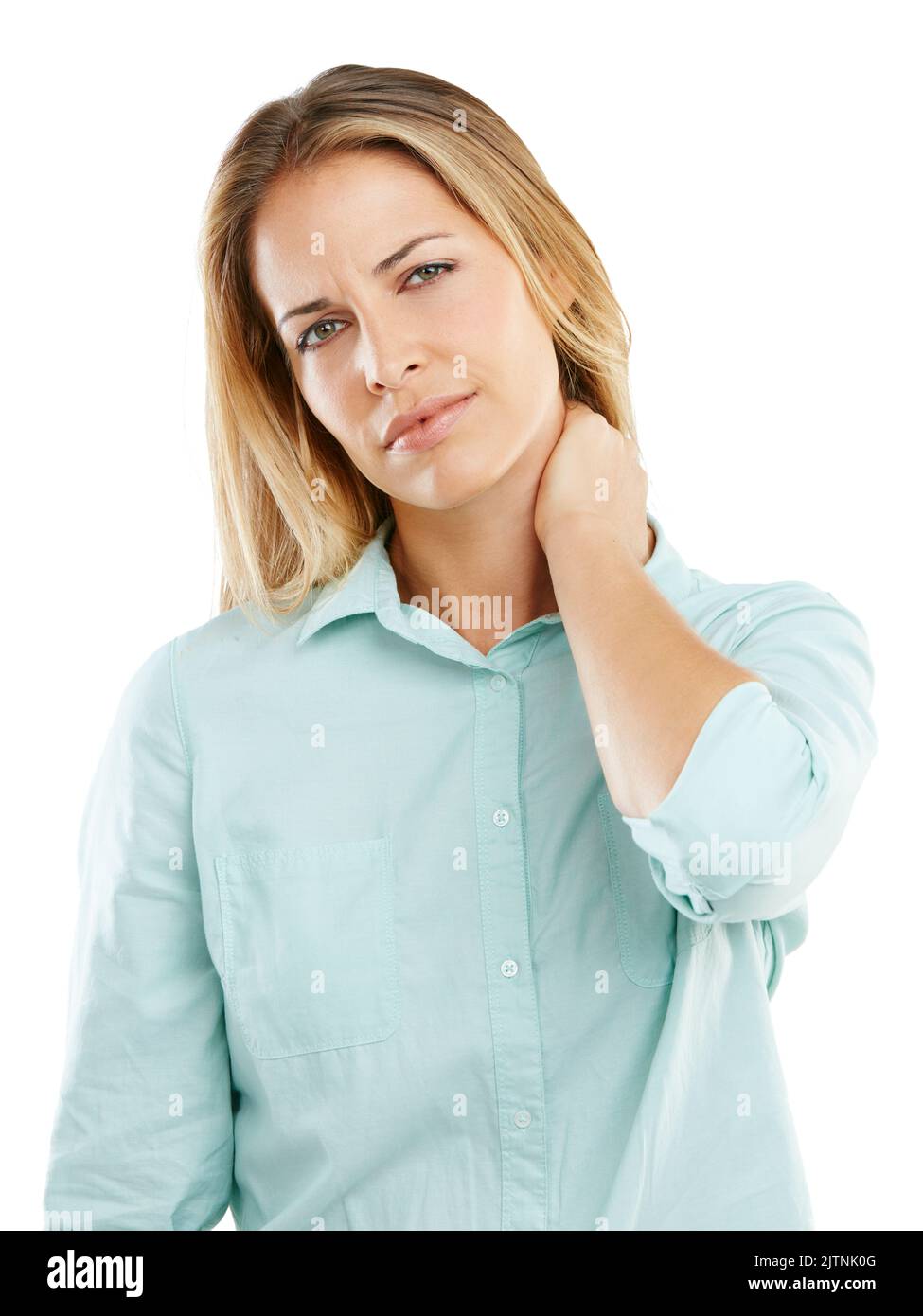 I definitely need a massage. an unhappy woman rubbing her sore neck ...