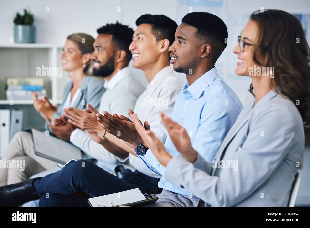 Applause, support and success with a team of business people clapping ...