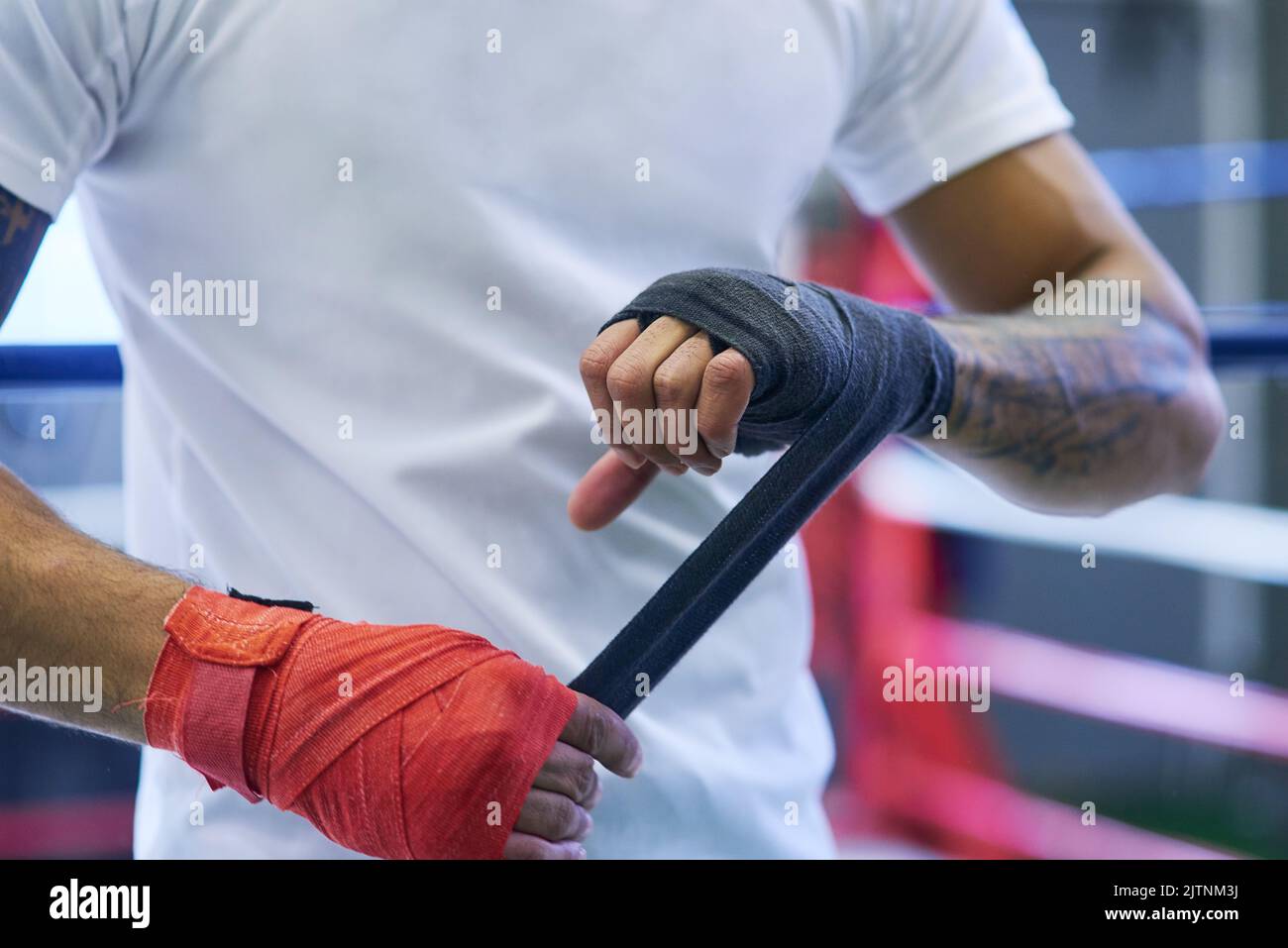 Adding support where you need it most. an unrecognizable man strapping ...