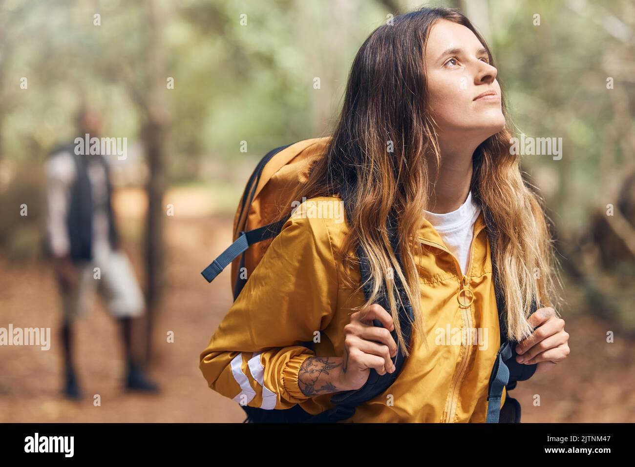 Wellness, nature and adventure with a female backpacker explore a ...