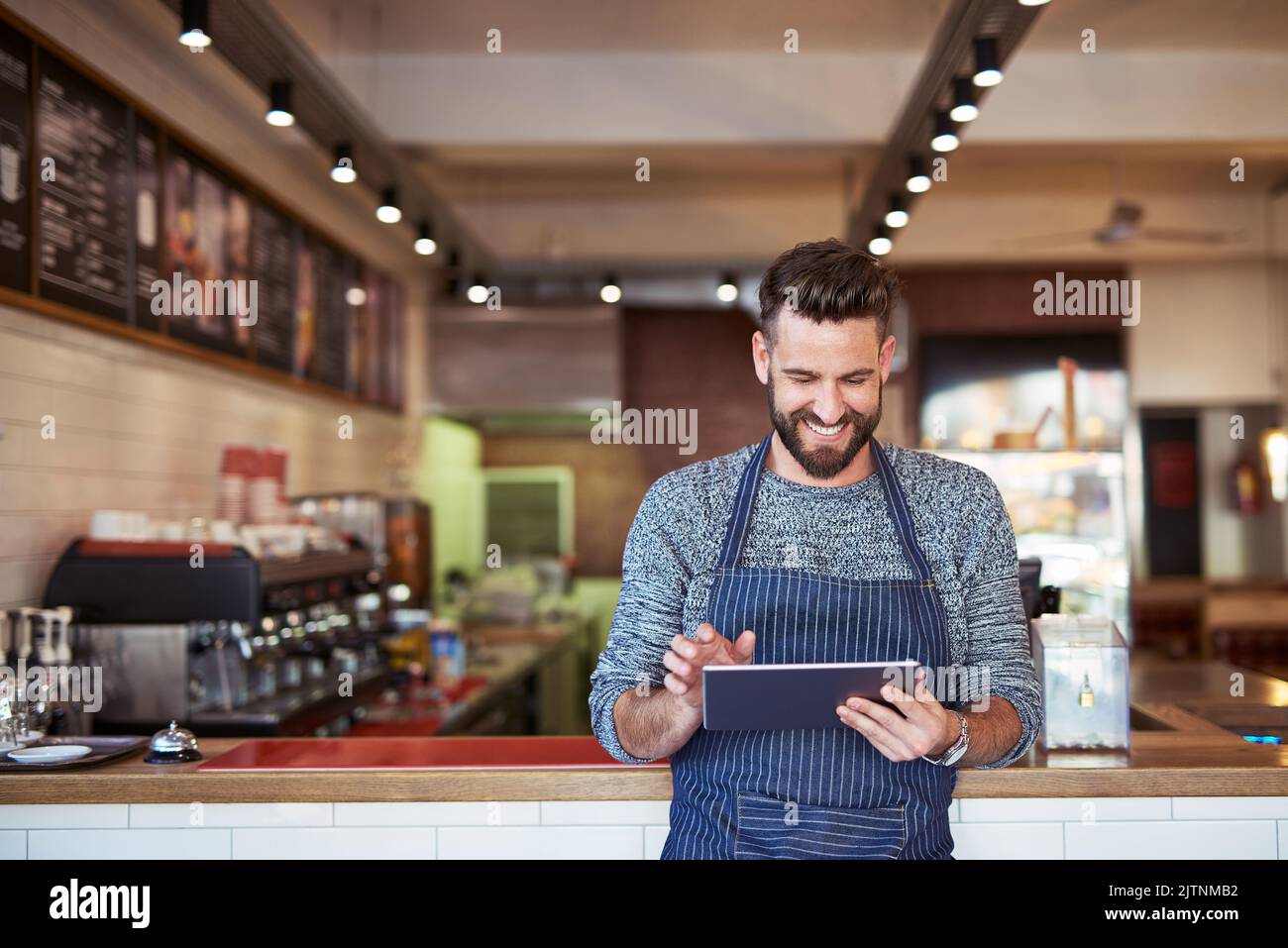 Every modern business needs technology to grow. a business owner using ...