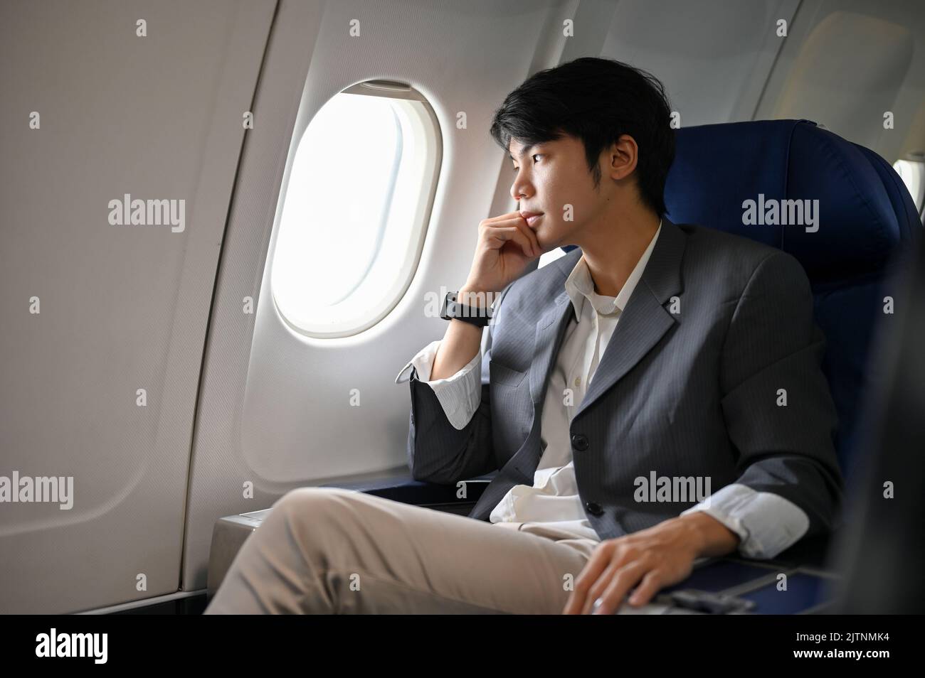 Handsome and smart young Asian businessman or business boss in formal ...