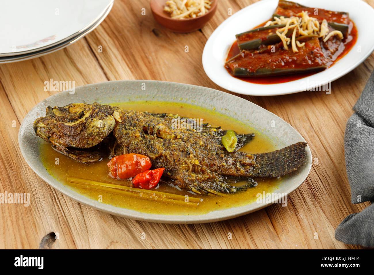 Spicy Gourami Fish Stew in Yellow Curry Spice. Thai and Indonesia Style ...