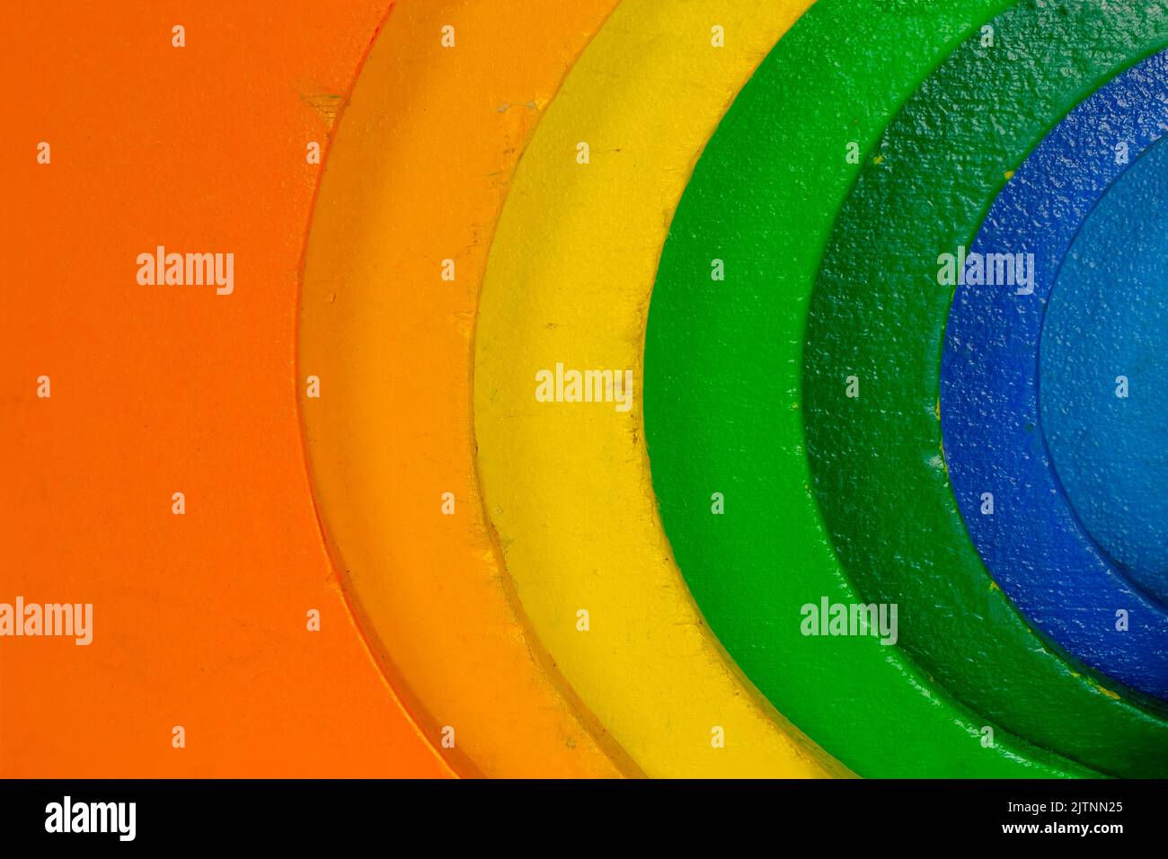 Multicolored children's wooden toy blocks with concentric circles cut ...