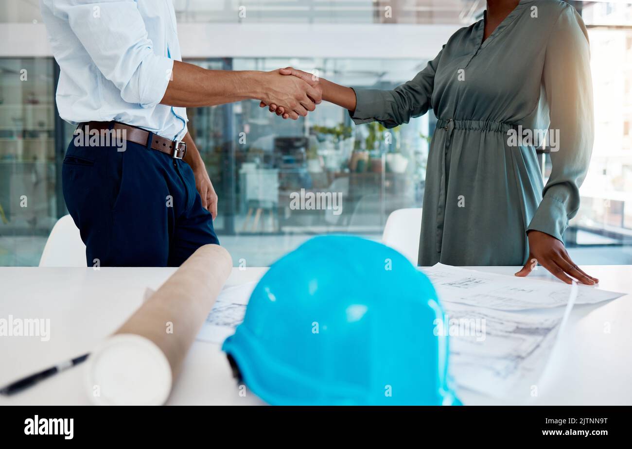 Architecture, shaking hands and a thank you handshake by engineer with ...