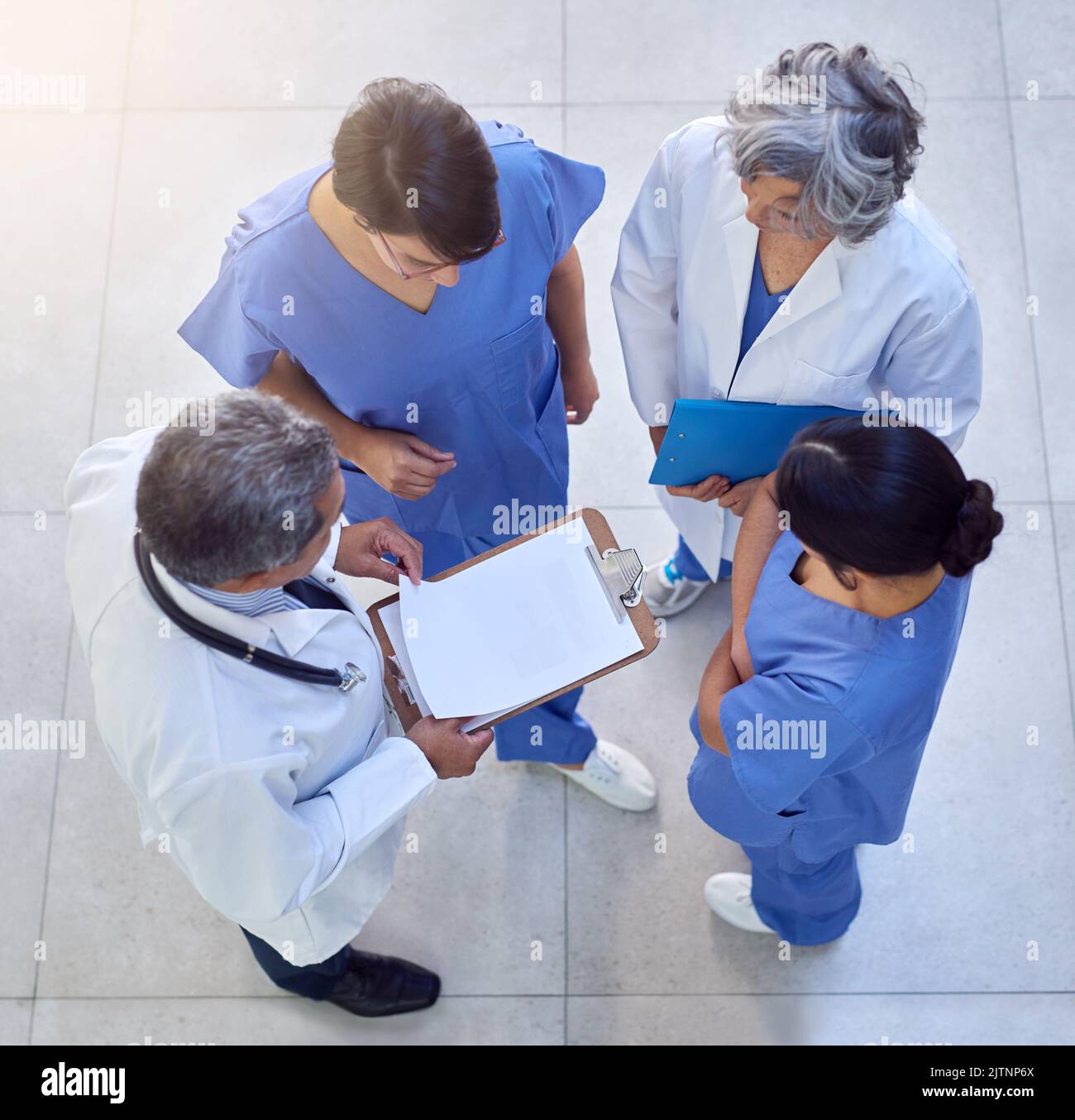 Deciding on the best treatment for their patients. High angle shot of a ...