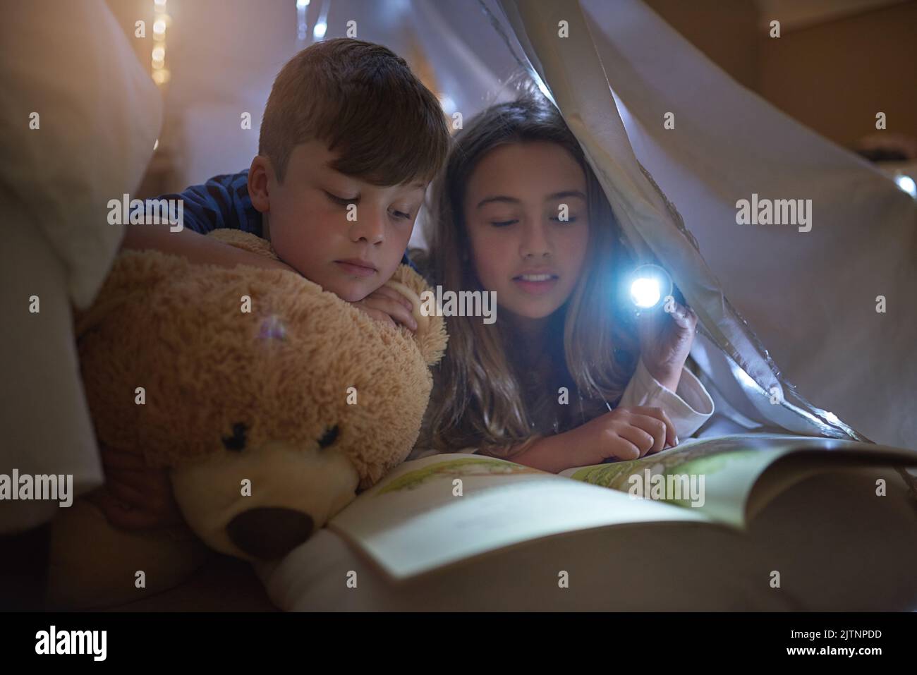 Why sleep when you could read instead. siblings reading a book by ...