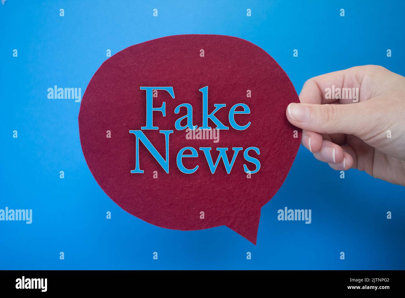 Speech bubble in front of colored background with Fake News text Stock ...