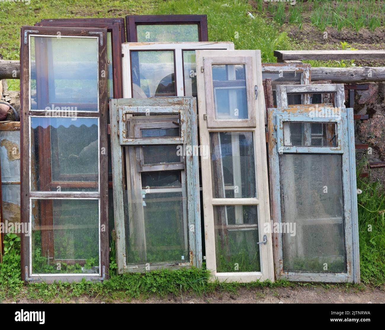 Old wooden broken windows on village garbage dump Stock Photo - Alamy