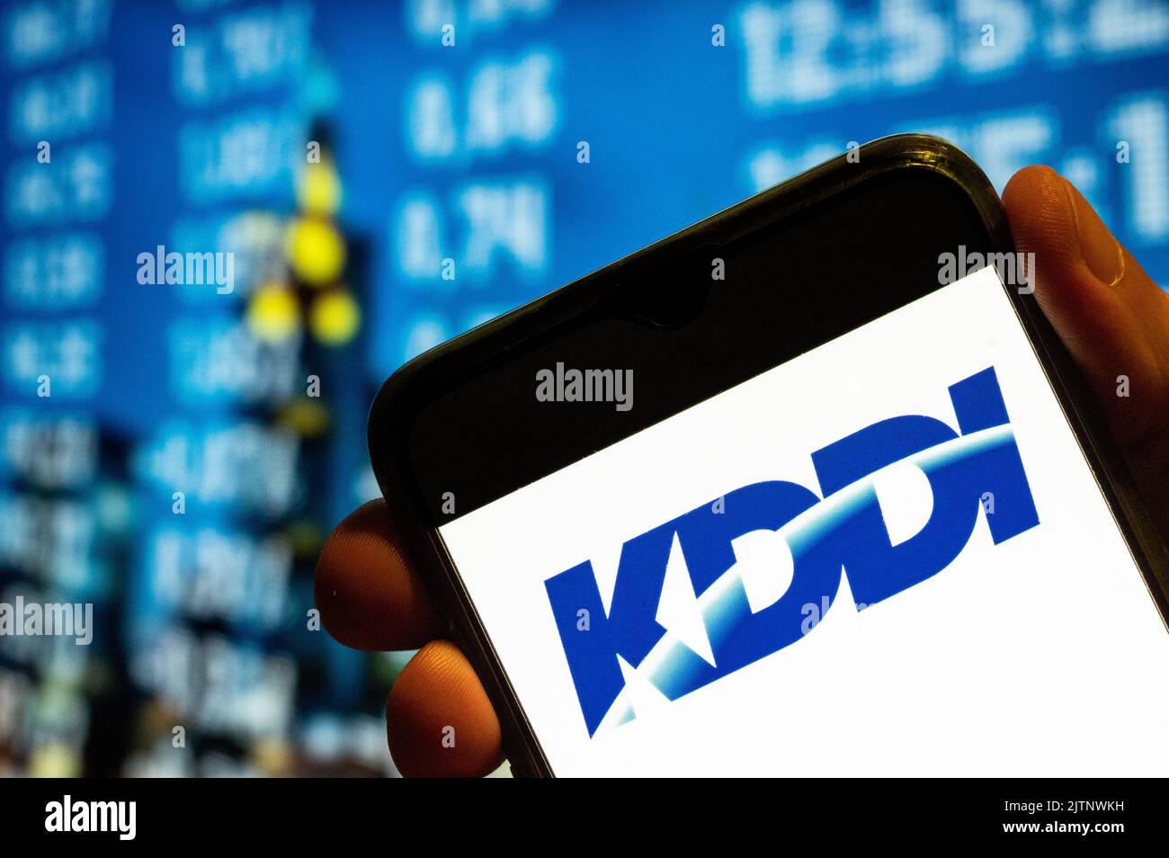 In this photo illustration, the Japanese telecommunications operator company KDDI logo is ...
