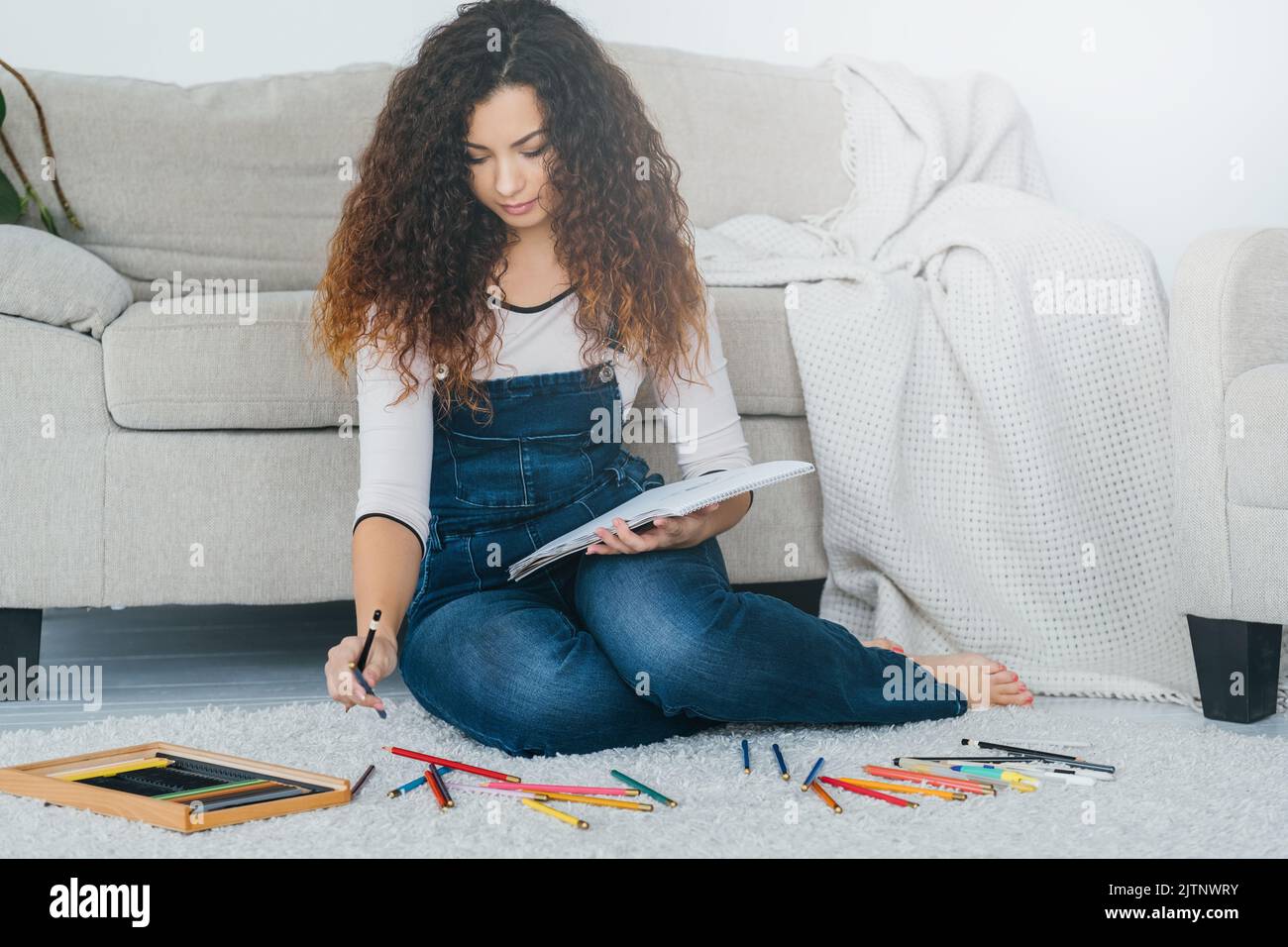 drawing hobby talented lady colored pencils Stock Photo - Alamy