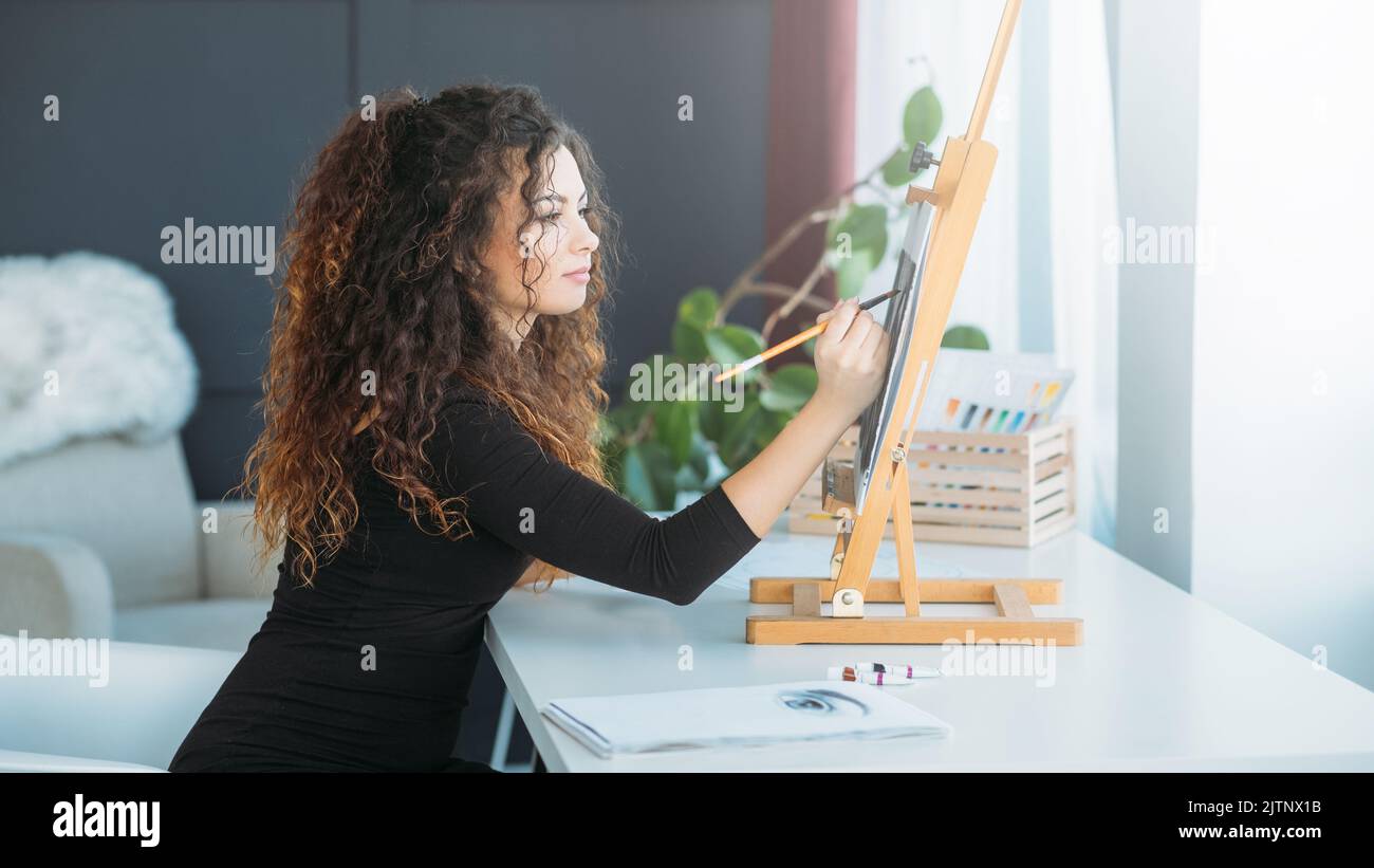 art career talented lady paint artwork home studio Stock Photo - Alamy