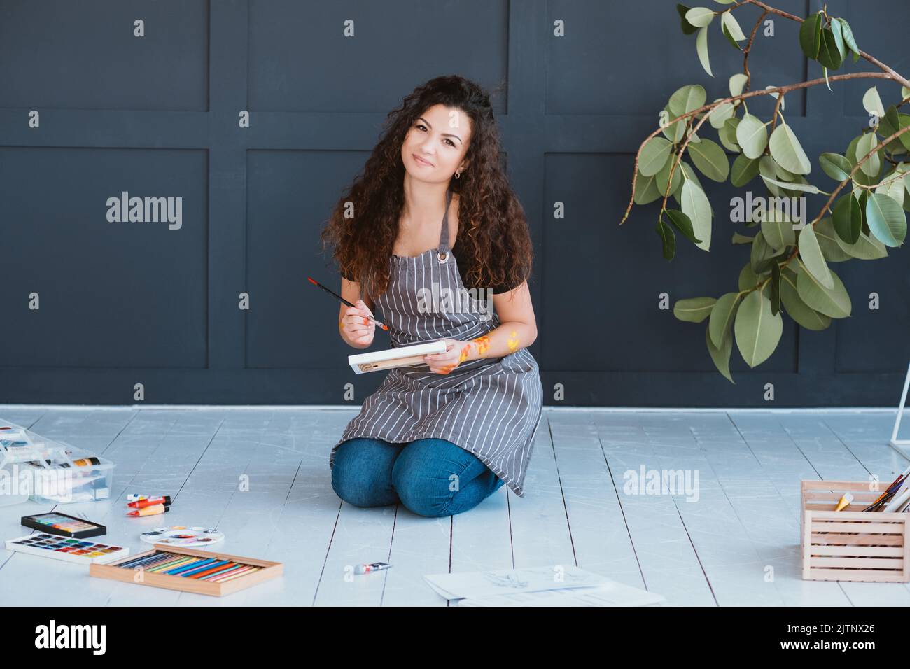 modern art therapy creative lady canvas painting Stock Photo - Alamy