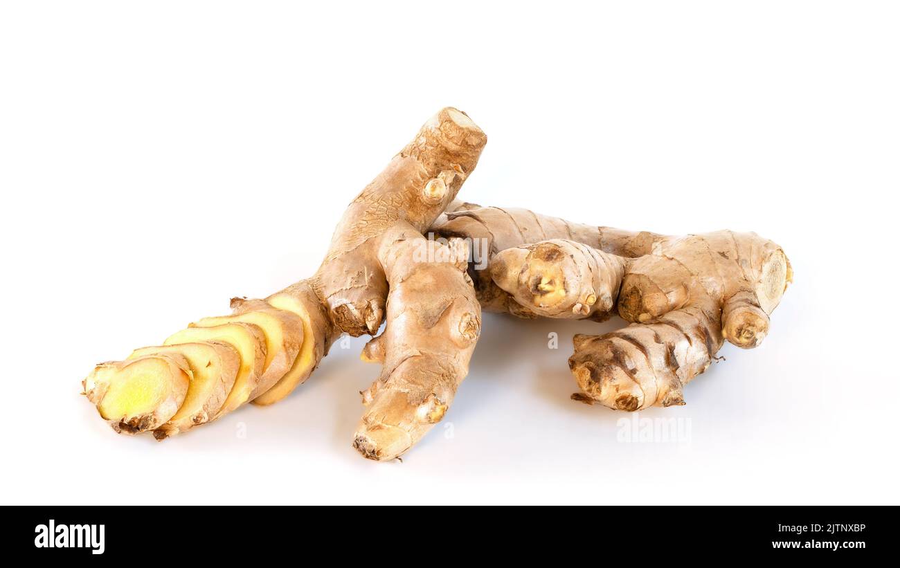 Ginger rhizomes isolated on white background Stock Photo - Alamy