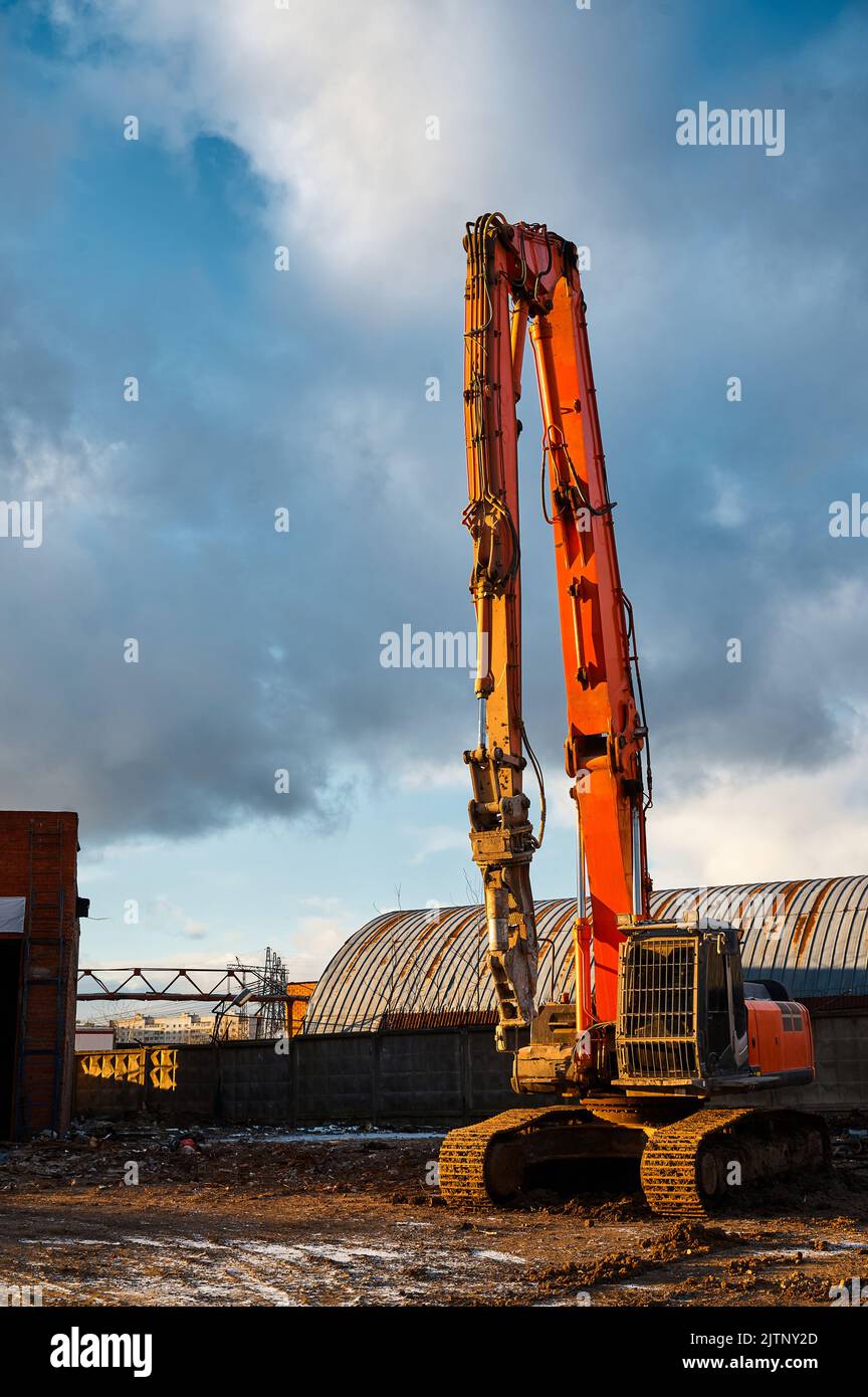 Special excavator destroyer with scissors at demolition site Stock ...