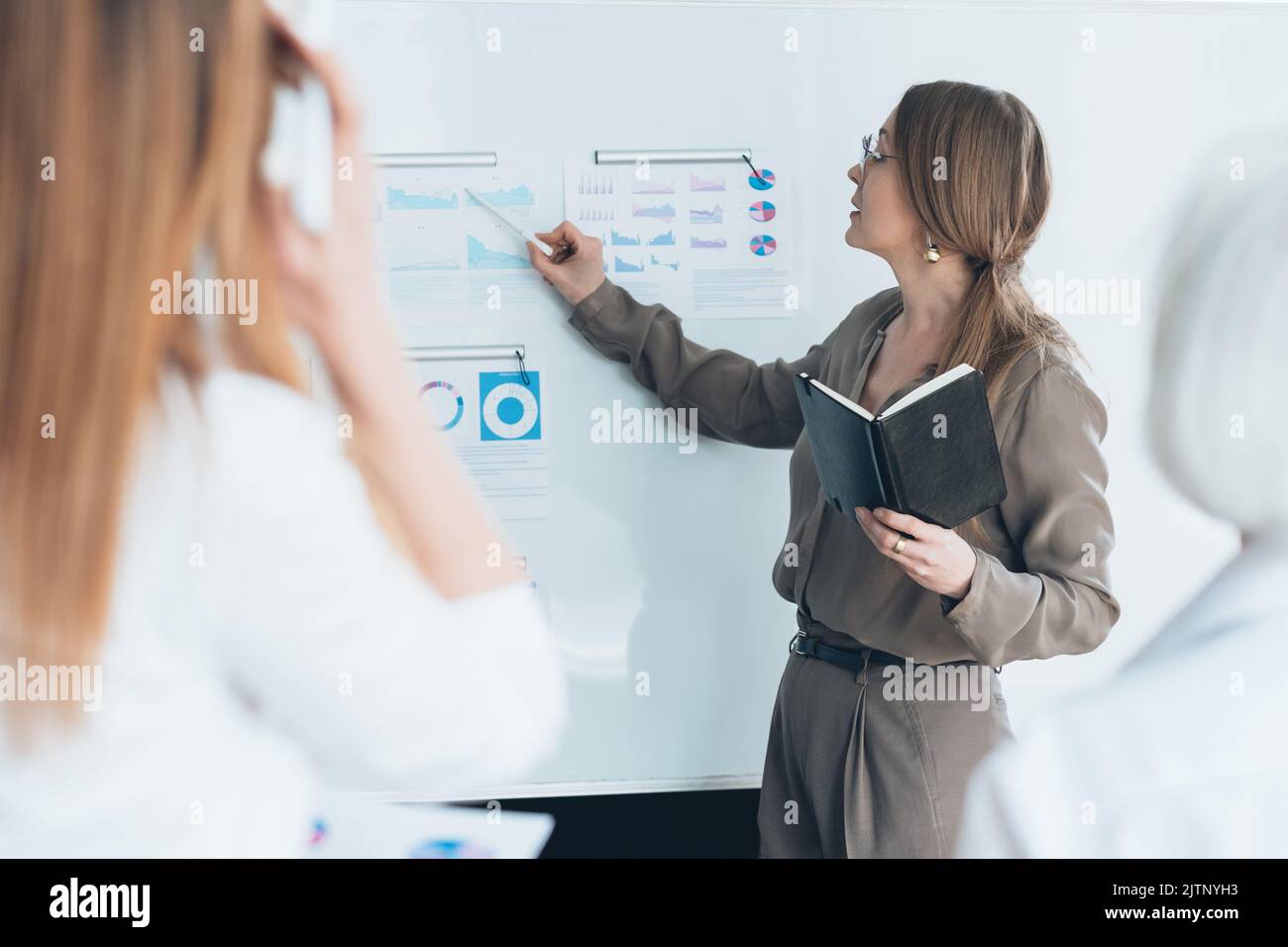 business lady presentation analysis infographics Stock Photo - Alamy