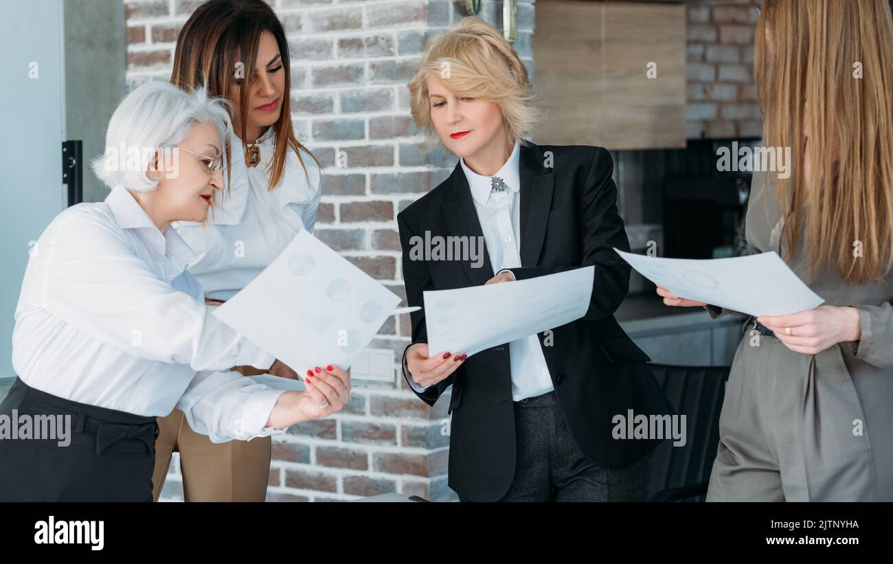 business women teamwork analysis brainstorming Stock Photo - Alamy
