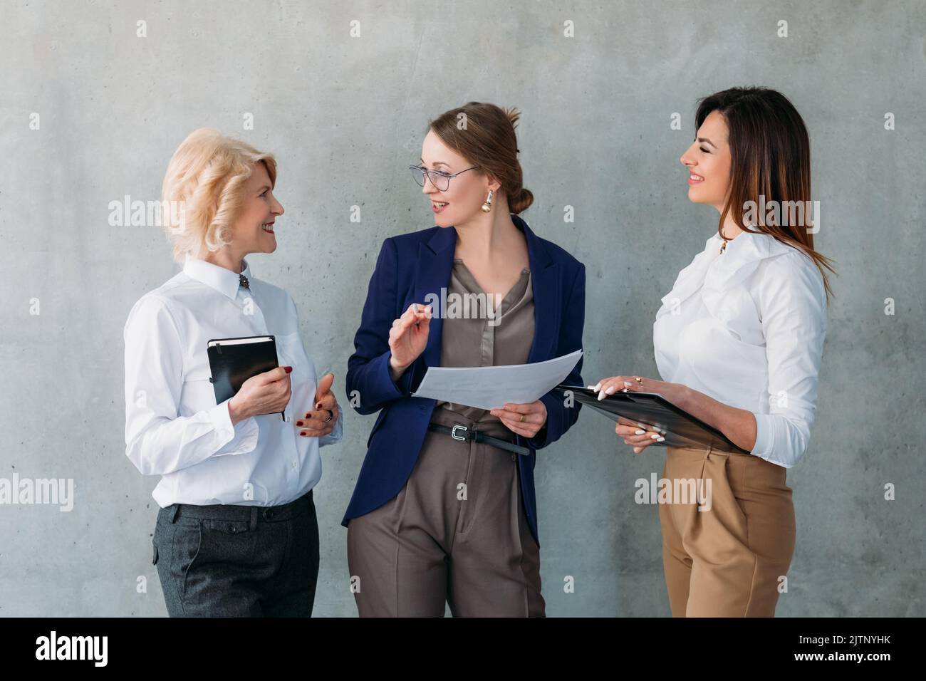 business conversation successful business women Stock Photo - Alamy
