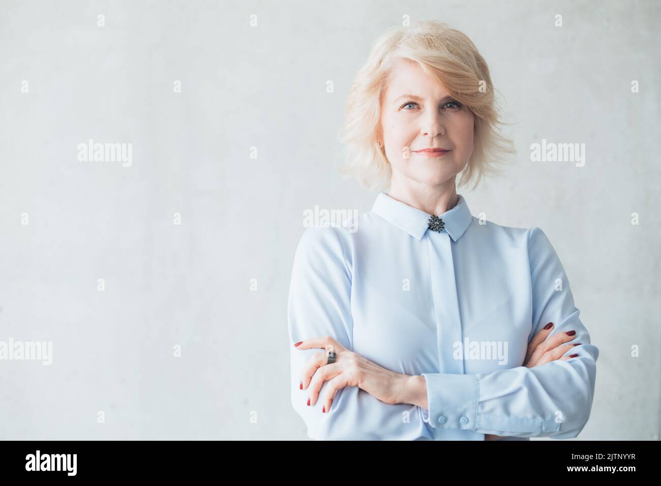 confident smart intelligent mature business woman Stock Photo - Alamy