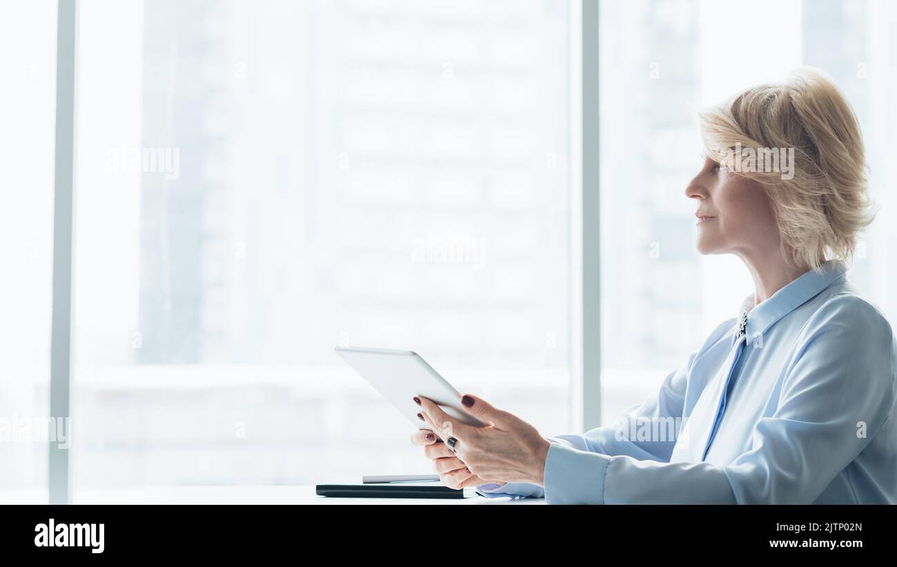 Mature adult ceo woman professional hi-res stock photography and images ...