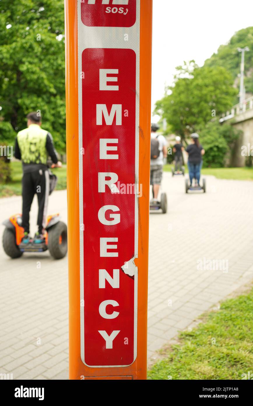 Segway passing and emergency sign in the streets Stock Photo - Alamy