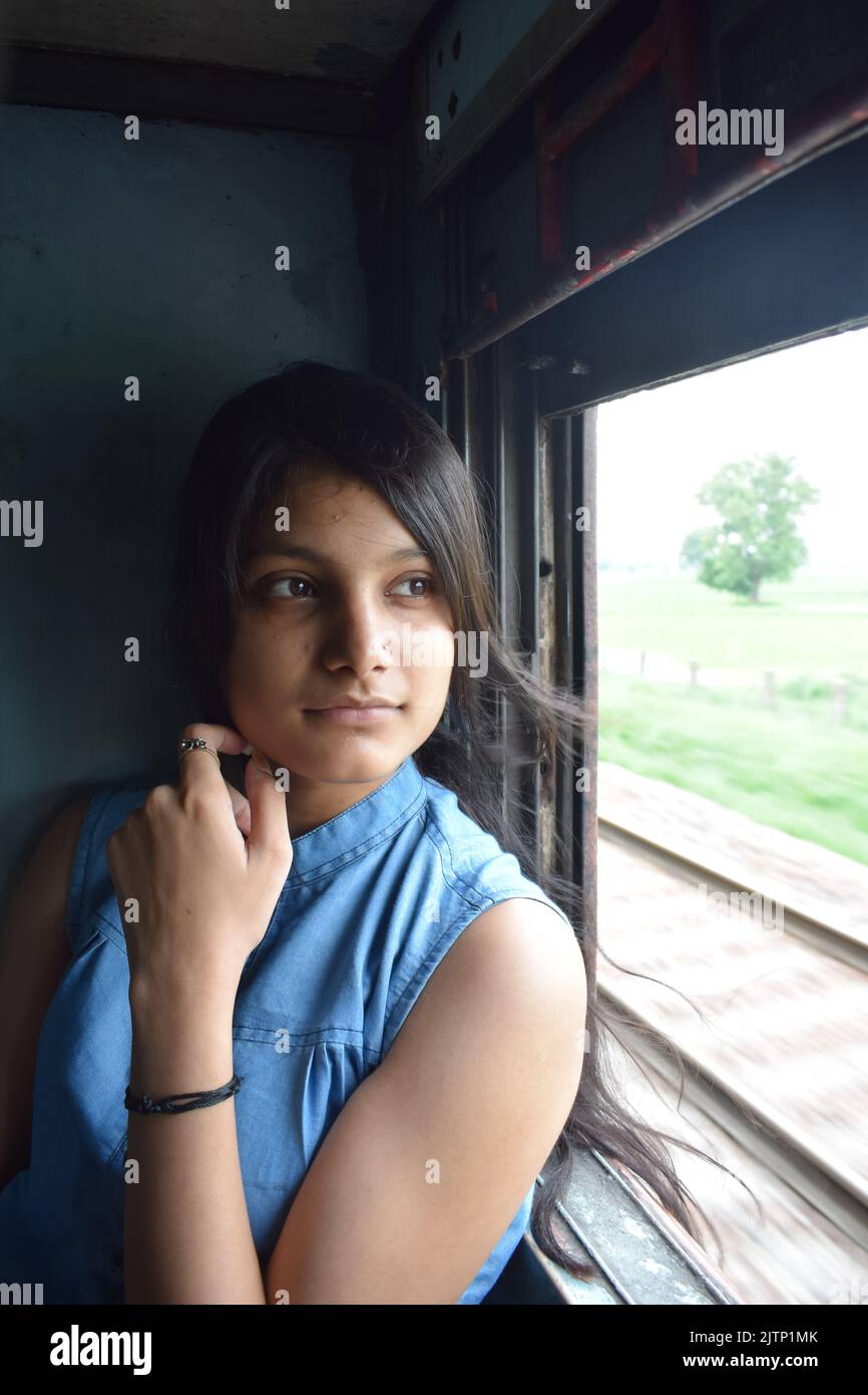 India train people sitting hi-res stock photography and images - Alamy