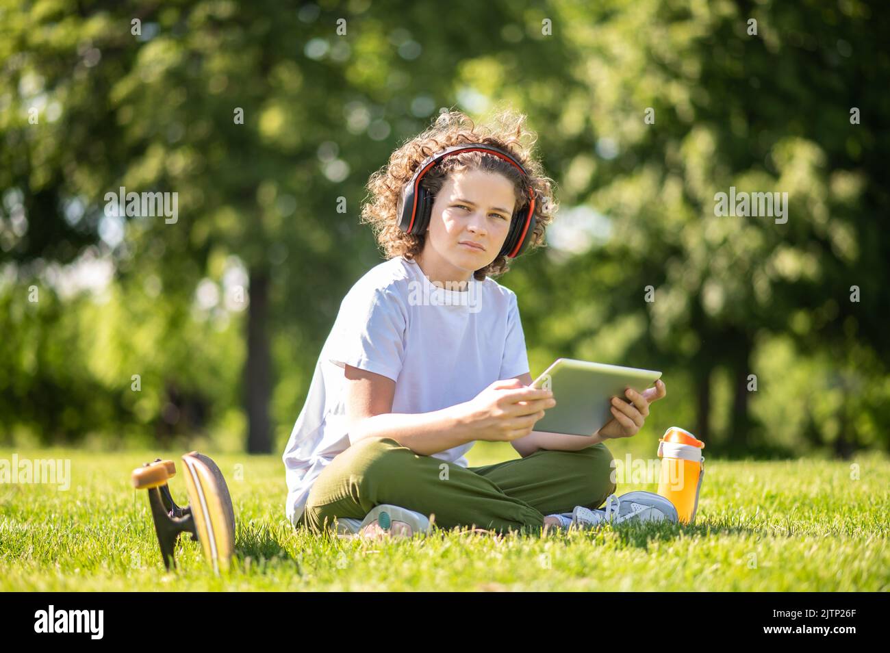 Cute adolescent boy spending time in nature Stock Photo - Alamy