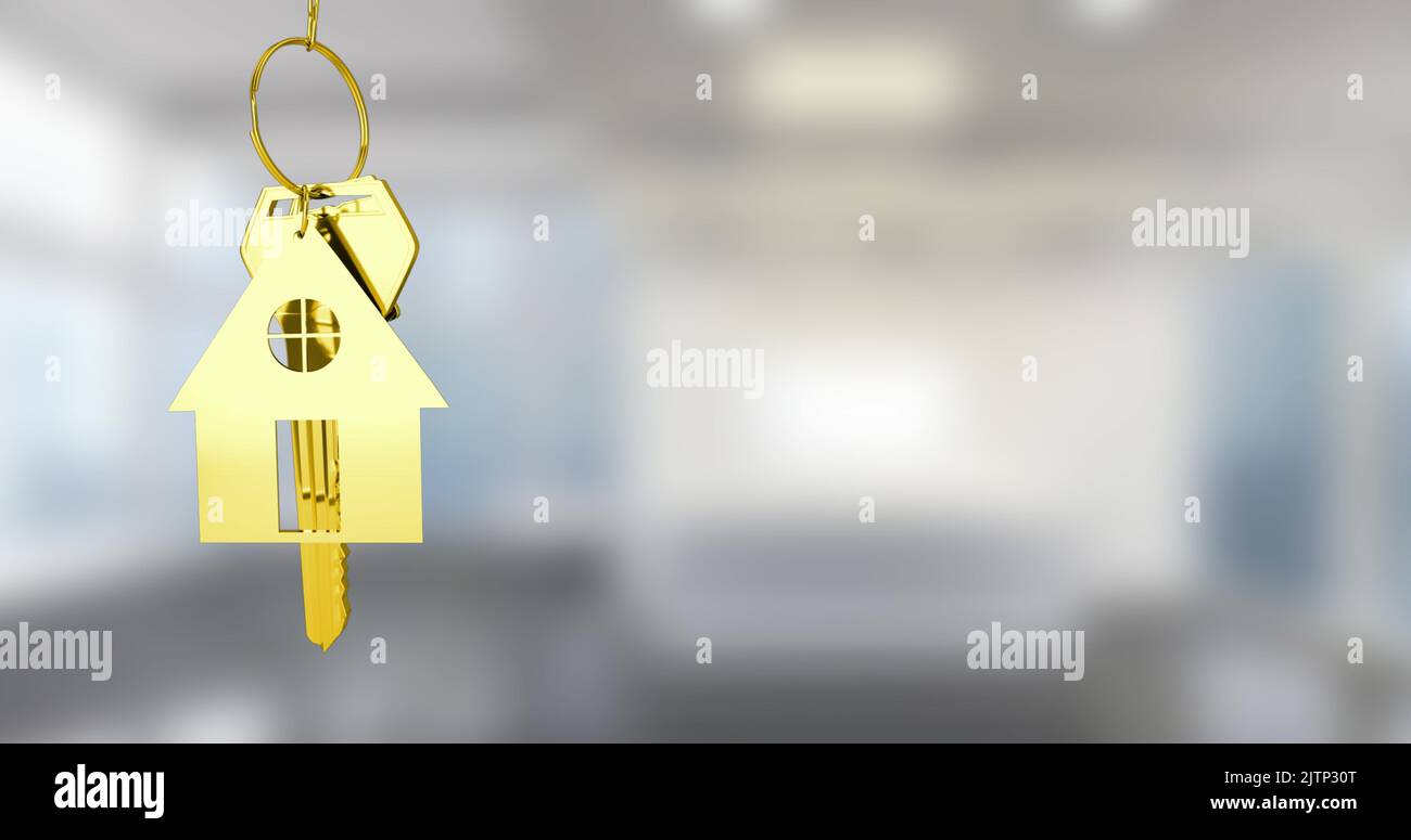 Image of golden house keys hanging against blurred background with copy ...
