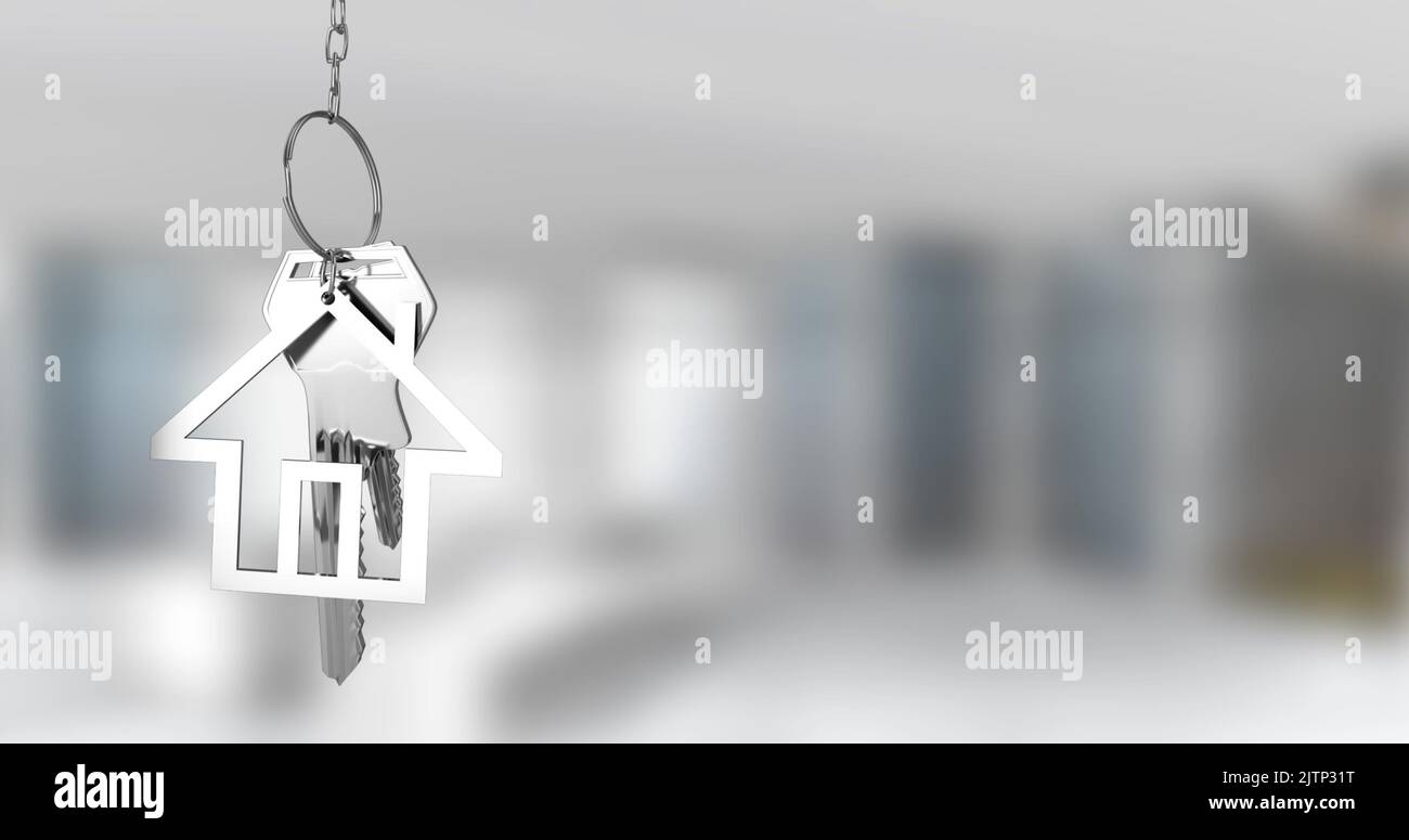 Image of silver house keys hanging against blurred background with copy ...